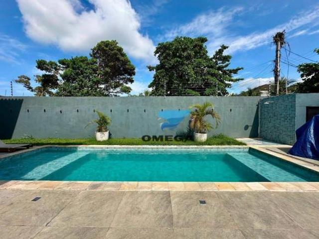 Casa à venda na Praia do Pernambuco no Guarujá | Omega Imóveis