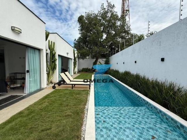Casa à venda na Praia do Pernambuco no Guarujá | Omega Imóveis