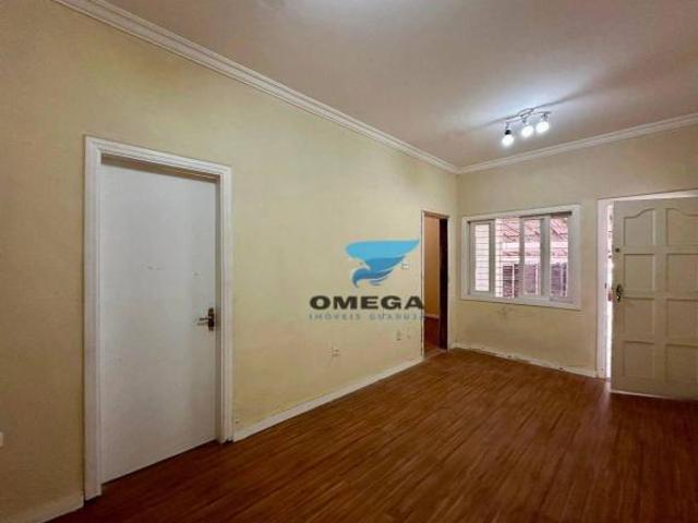 Casa à venda na Praia das Pitangueiras no Guarujá | Omega Imóveis