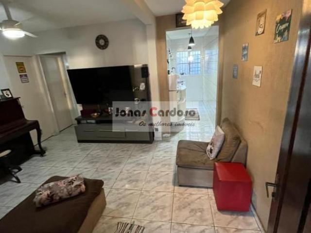 Casa à venda na Vila Caputera, Mogi das Cruzes SP: 2 quartos, sala ampla, 2 vagas de garagem, 115m²