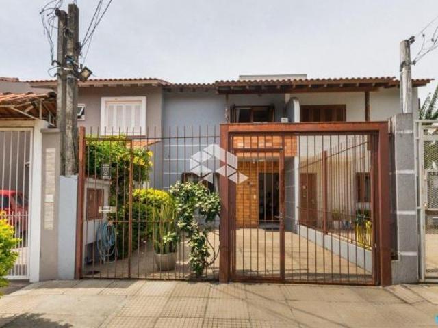 Casa à venda na Zona Sul 2 dormitórios 2 vagas de garagem no bairro Campo Novo Zona Sul de POA/RS