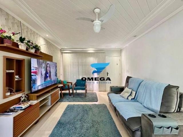 Casa à venda nas Astúrias no Guarujá | Omega Imóveis