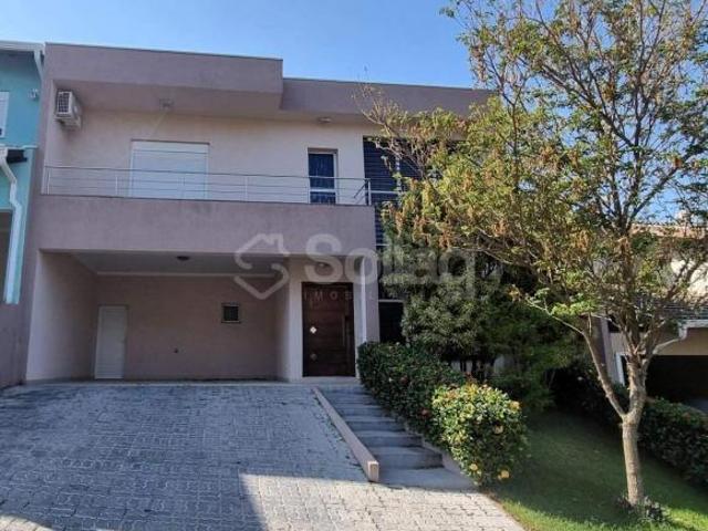 Casa á venda próxima do Anel Viário  com três suítes, varanda gourmet no Condomínio Canterville Res