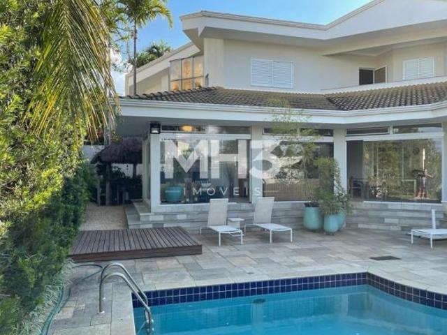 CASA À VENDA R$ 4.150.000,00 NO COND. ALPHAVILLE CAMPINAS COM 5 DORM. 4 SUÍTES