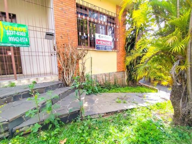 CASA Á VENDA RUA ROQUE CALAGE