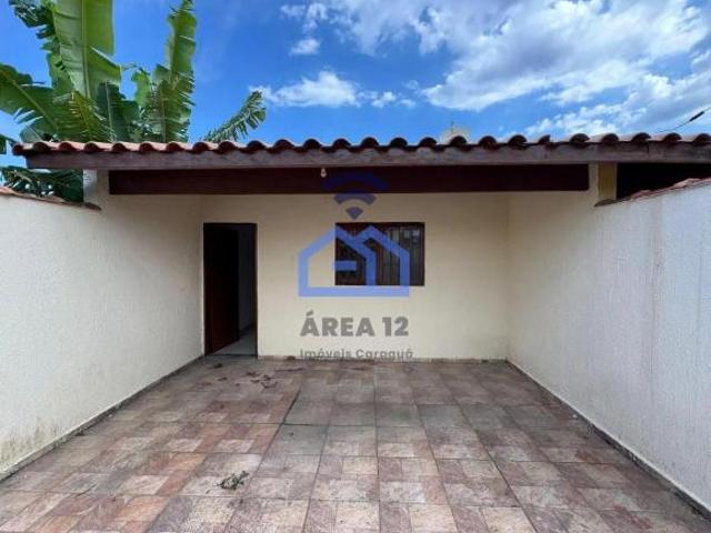 Casa aconchegante à venda no bairro Jardim das Palmeiras em Caraguatatuba, SP Seu novo lar espera