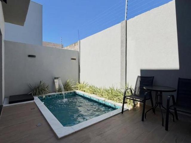 Casa Alto Padrão no Jardim Casqueiro | 170 m² | 2 Suítes | Área Gourmet | 4 Vaga