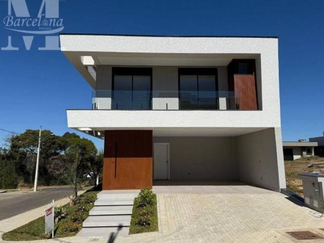 CASA ALTO PADRÃO NOVA E PRONTA NO GREEN GARDEN COM 3 SUÍTES EM SANTA FELICIDADE. DE ESQUINA. LIND