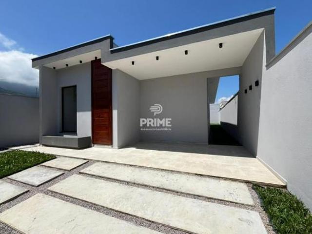 Casa alto padrão á venda com 2 suítes por R$ 750.000,00 no bairro Massaguaçu Caraguatatuba SP
