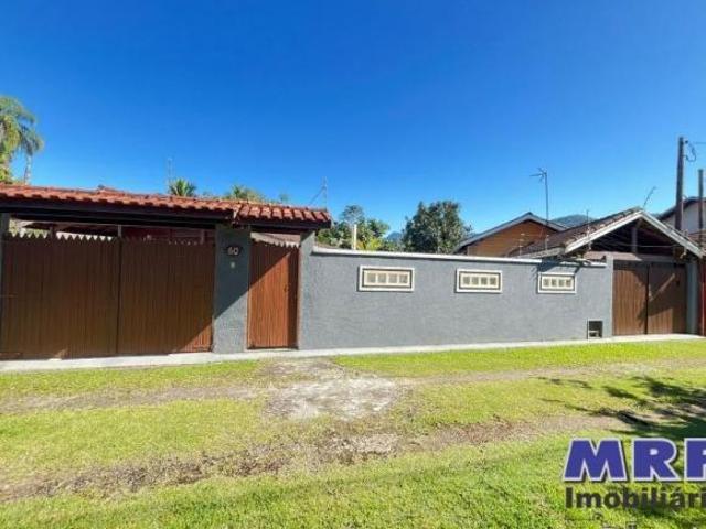 Casa alto padrão à venda em Ubatuba, bairro Tabatinga. 4 suítes. Com piscina e area gourmet. Não ace