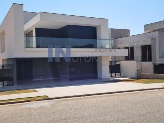 CASA ALTO PADRÃO COM 4 SUÍTES SENDO 1 NO TÉRREO, 4 VAGAS, ÁREA GOURMET E PISCINA A VENDA NO COND