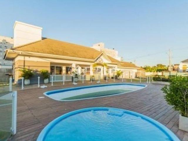 Casa Alto Padrão com 3 Quartos, 2 Suítes, Piscina Aquecida e Área Gourmet no Condomínio Vivenda dos
