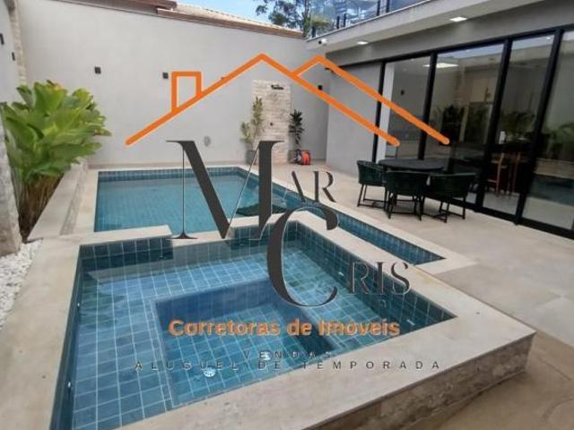 CASA ALTO PADRÃO COM PISCINA CONDOMINIO FECHADO MASSAGUAÇU CARAGUATATUBA