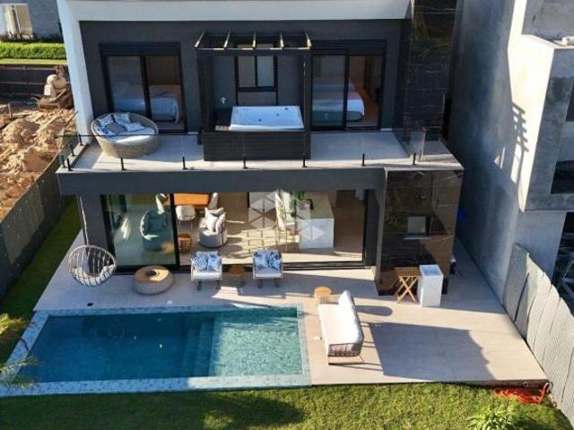 Casa alto padrão condomínio Sunset em Xangri Lá 04 suítes, 02 vagas