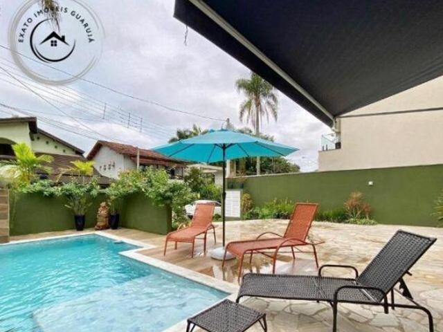Casa alto padrão de 04 dormitórios à venda no condomínio Pernambuco II Guarujá SP