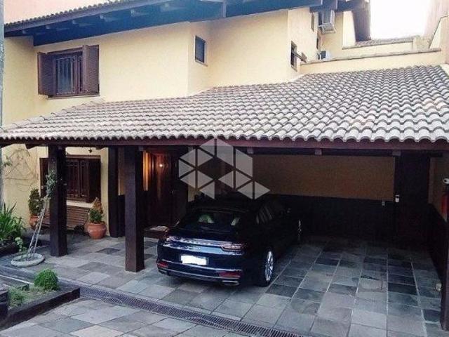 Casa Alto Padrão em condomínio fechado com vista para Guaíba!