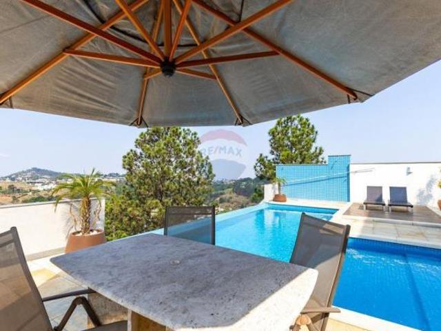 Casa Alto Padrão 3 quartos, 3 suítes, área gourmet com piscina borda infinita, 4 vagas, Condomínio S