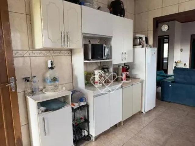 Casa Ampla com 3 Quartos e Pátio Grande no Bairro Caça e Pesca – Excelente Oportunidade!