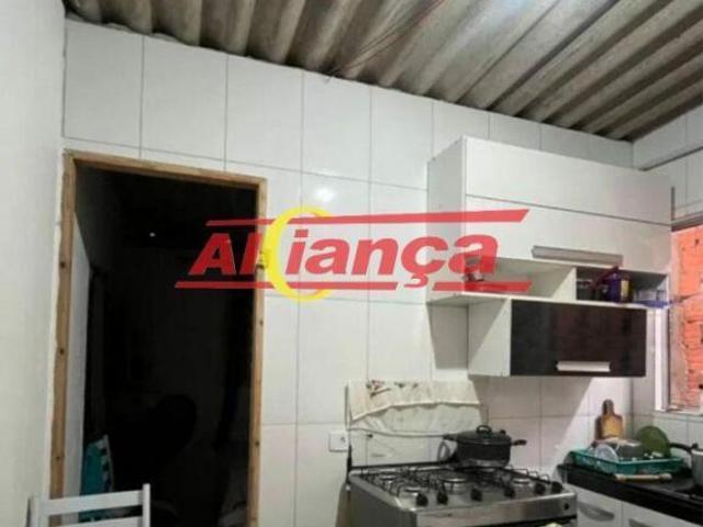 Casa ampla com potencial para duas moradias no Jardim Tranquilidade em Guarulhos