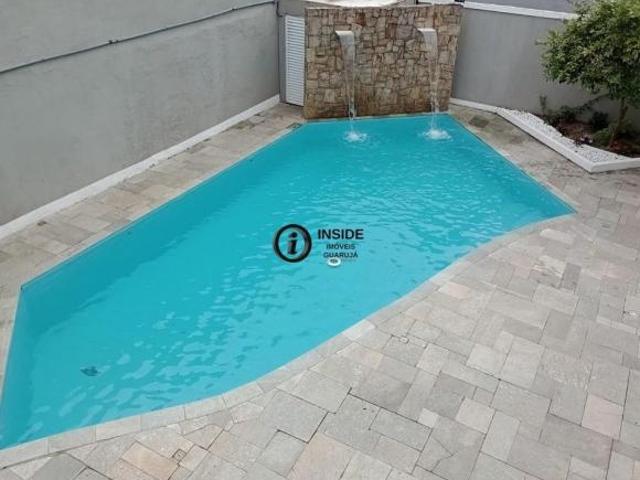 Casa assobradada com 4 suítes na enseada guarujá