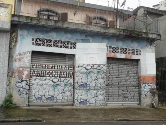 Casa Assobradada com salão comercial
