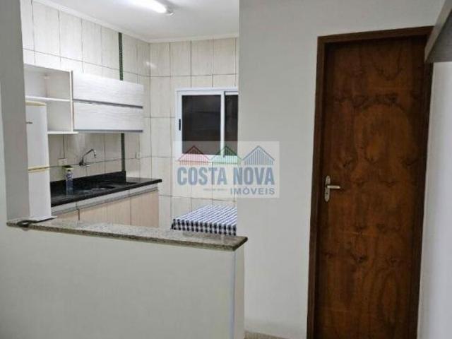 Casa assobradada em condomínio fechado à 500m da praia na Aviação Praia Grande SP
