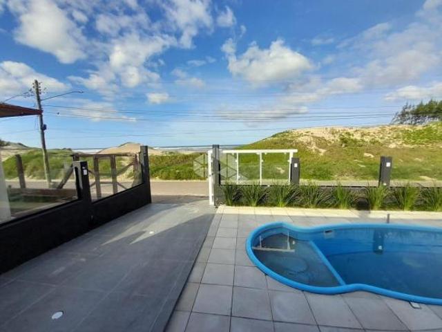 Casa Beira Mar 3 dormitórios sendo 2 suítes piscina + 2 anexos no fundos com 3 dormitórios e 3 ban