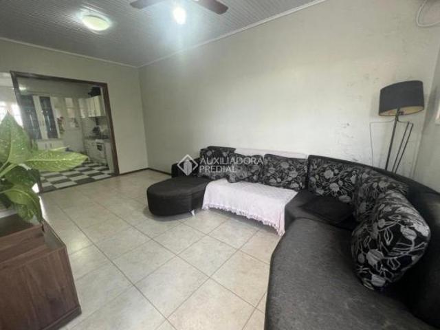 Casa belíssima com 2 dormitórios sendo 1 suíte à venda no bairro Jardim dos Lagos