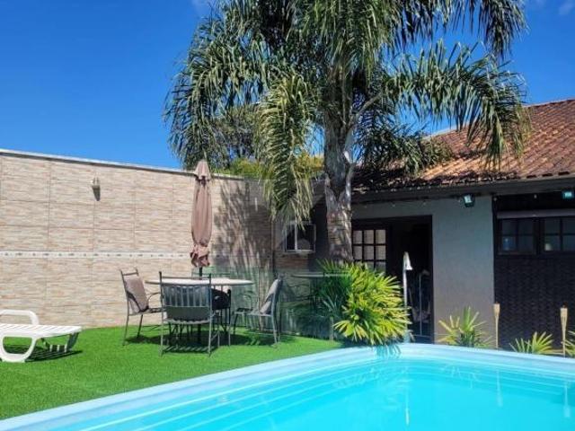 Casa central em Almirante Tamandaré com piscina Semimobiliada