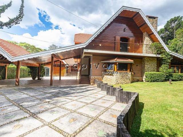Casa charmosa em bairro privilegiado a venda em Campos do Jordão