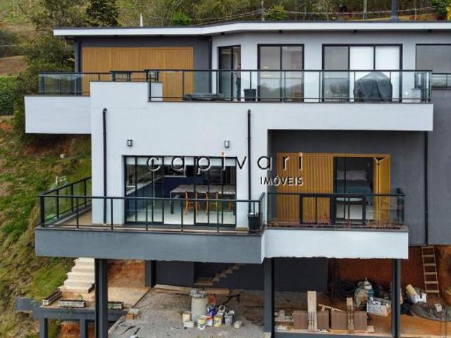 Casa clean, moderna, nova, 3 suítes, vista panorâmica em condomínio fechado