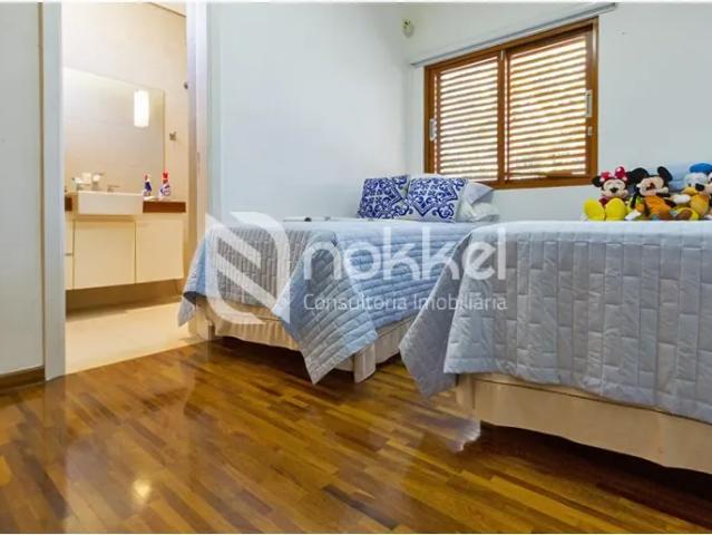 Casa com 400 m², 3 quartos sendo 3 suítes à venda no bairro Brooklin