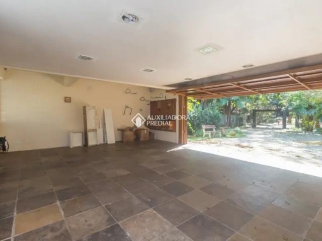 Casa com 460 m², 04 suítes no bairro jardim isabel