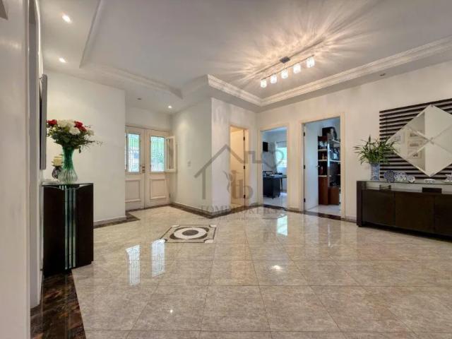 Casa com 4 dormitórios para alugar, 350 m² por R$ 22.000,00/mês Residencial Melville Santana de