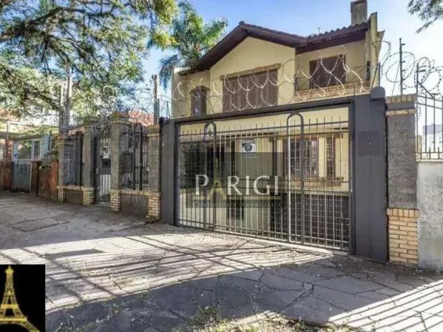 Casa com 4 dormitórios para alugar, 400 m² por R$ 9.383/mês Menino Deus Porto Alegre/RS