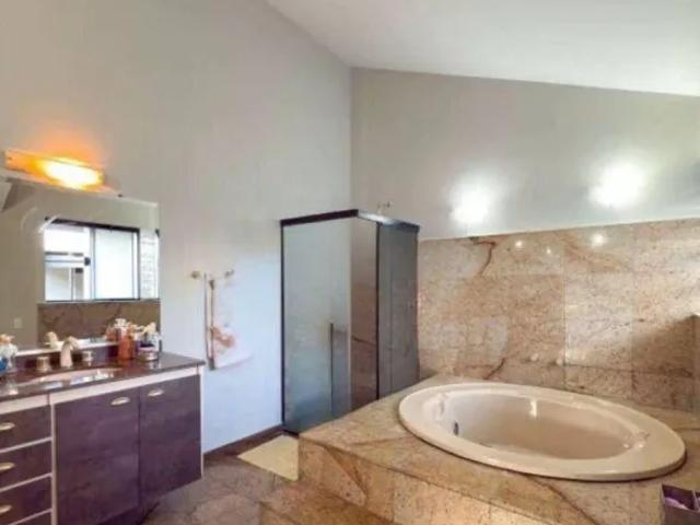 Casa com 4 dormitórios à venda, 460 m² por R$ 3.500.000,00 Residencial Dez Alphaville Santana