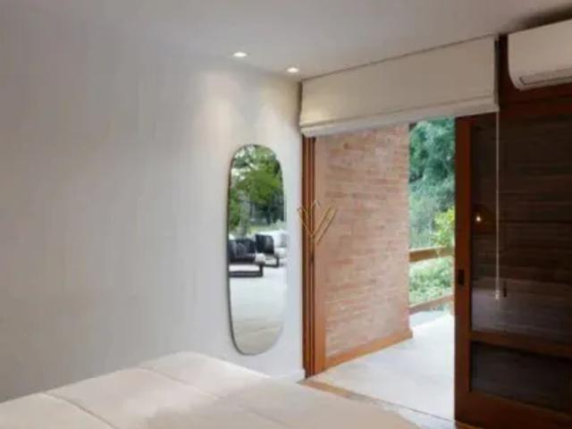 Casa com 4 dormitórios à venda, 695 m² por R$ 6.550.000,00 Alphaville 04 Santana de Parnaíba/SP