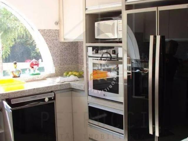 Casa com 4 dormitórios, 860 m² venda por R$ 3.400.000,00 ou aluguel por R$ 22.500,00 Parque Taqu