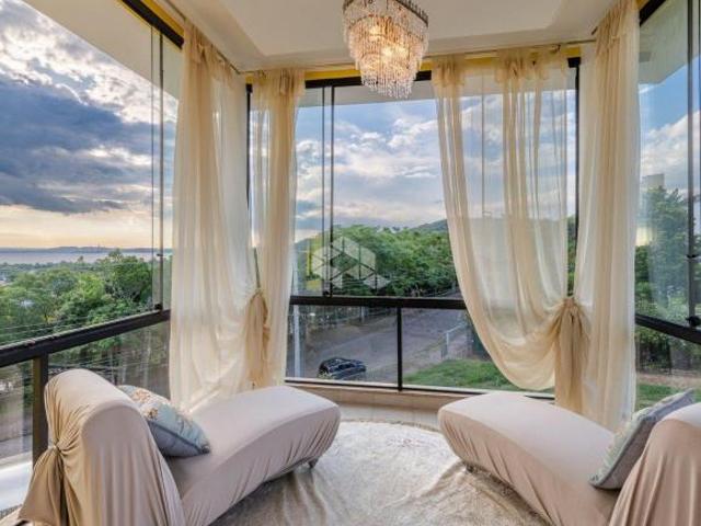 Casa com 4 dormitório s, 607 m² no bairro Jardim Isabel em Porto Alegre