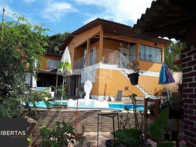 Casa com 4 dormitórios no bairro Vila Nova