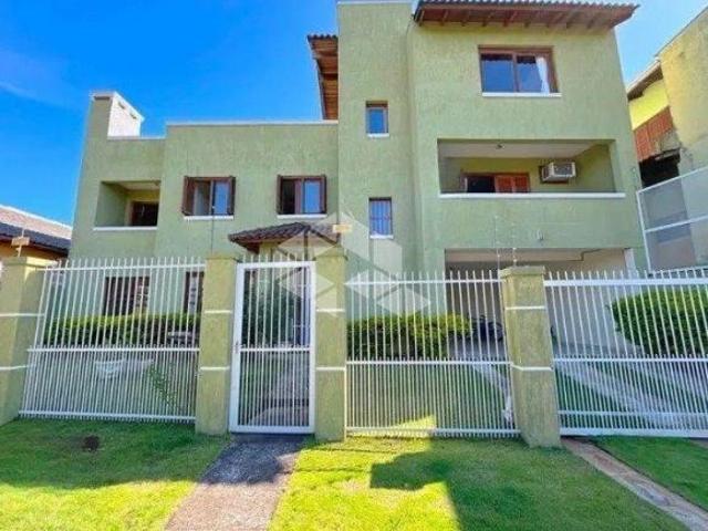 Casa com 4 dormitórios no bairro Camaquã em Porto Alegre