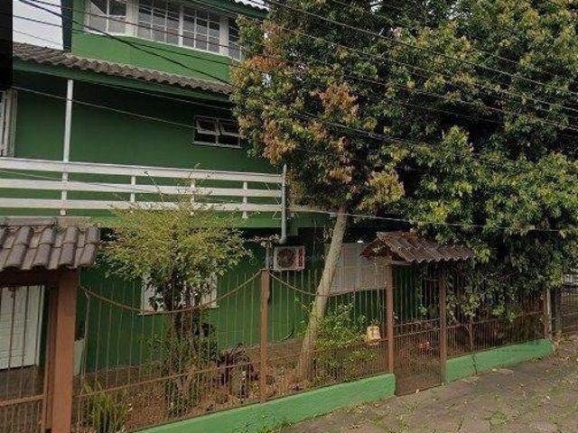 Casa com 4 dormitórios no bairro cavalhada