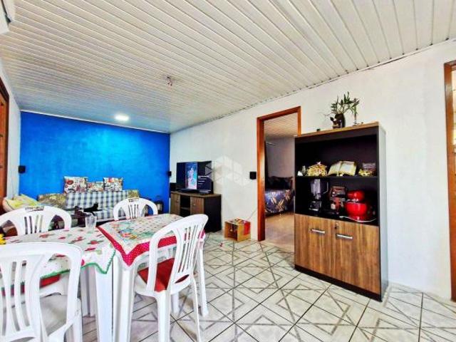 Casa com 4 dormitórios no bairro Farrapos em Porto Alegre