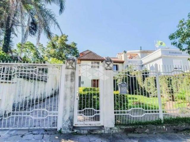 Casa com 4 dormitórios no bairro Ipanema em Porto Alegre