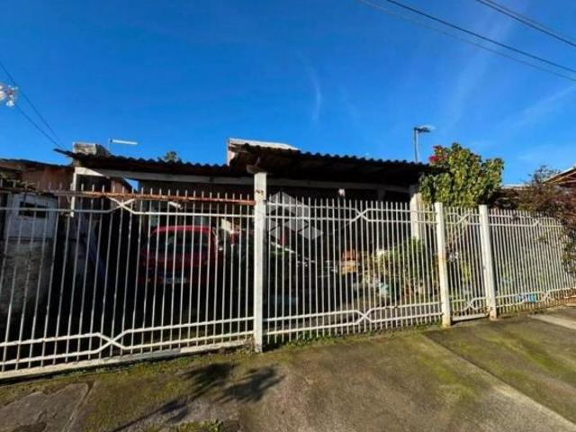Casa com 4 dormitorios no Guajuviras Canoas