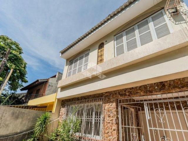 CASA COM 4 DORMITÓRIOS NO JARDIM BOTÂNICO