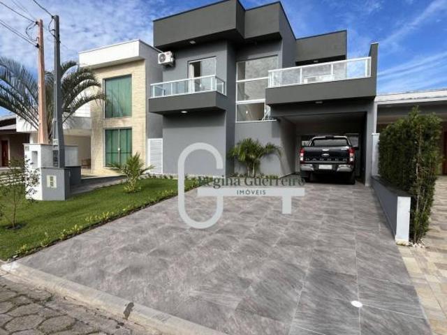 Casa com 4 dormitórios à venda, 115 m² por R$ 1.500.000,00 Residencial Três Marias Peruíbe/SP