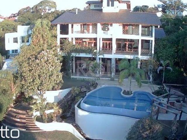 Casa com 4 dormitórios à venda, 1107 m² por R$ 3.700.000,00 Vila Assunção Po