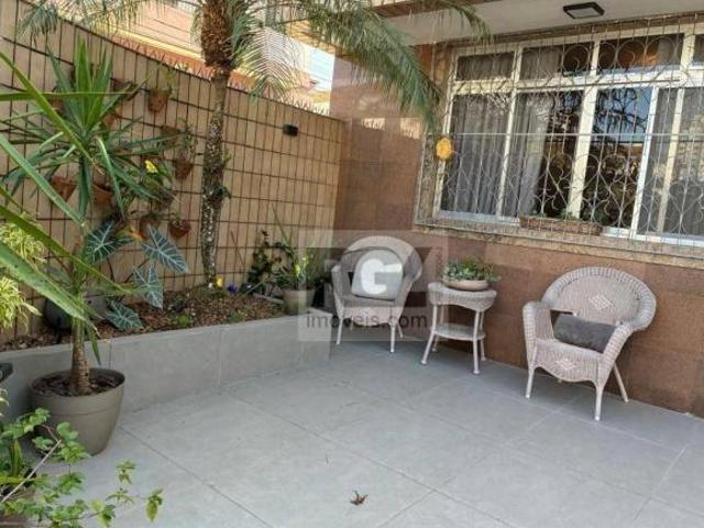 Casa com 4 dormitórios à venda, 127 m² por R$ 1.640.000,00 Ponta da Praia Santos/SP