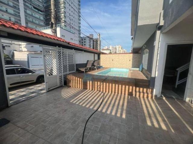 Casa com 4 dormitórios à venda, 123 m² por R$ 870.000 Vila Assunção Praia Grande/SP